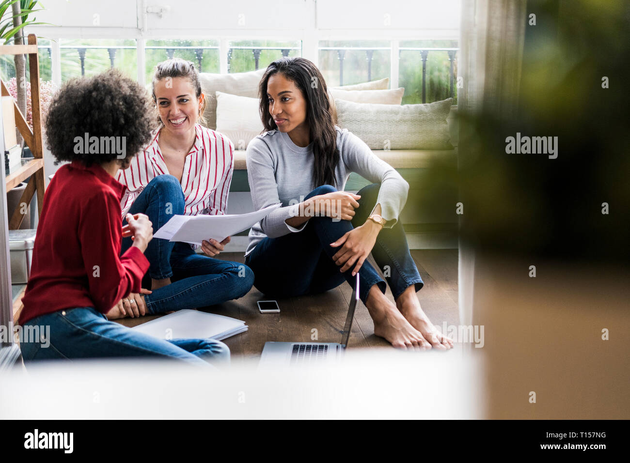 Three friends at home, living together Stock Photo - Alamy