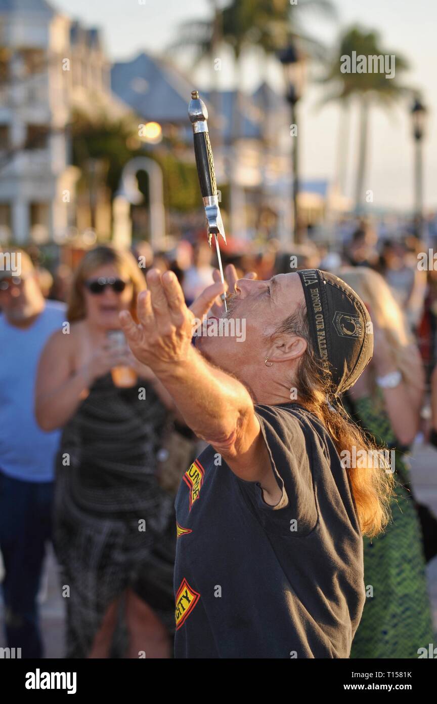 Sword swallowing hi-res stock photography and images - Alamy