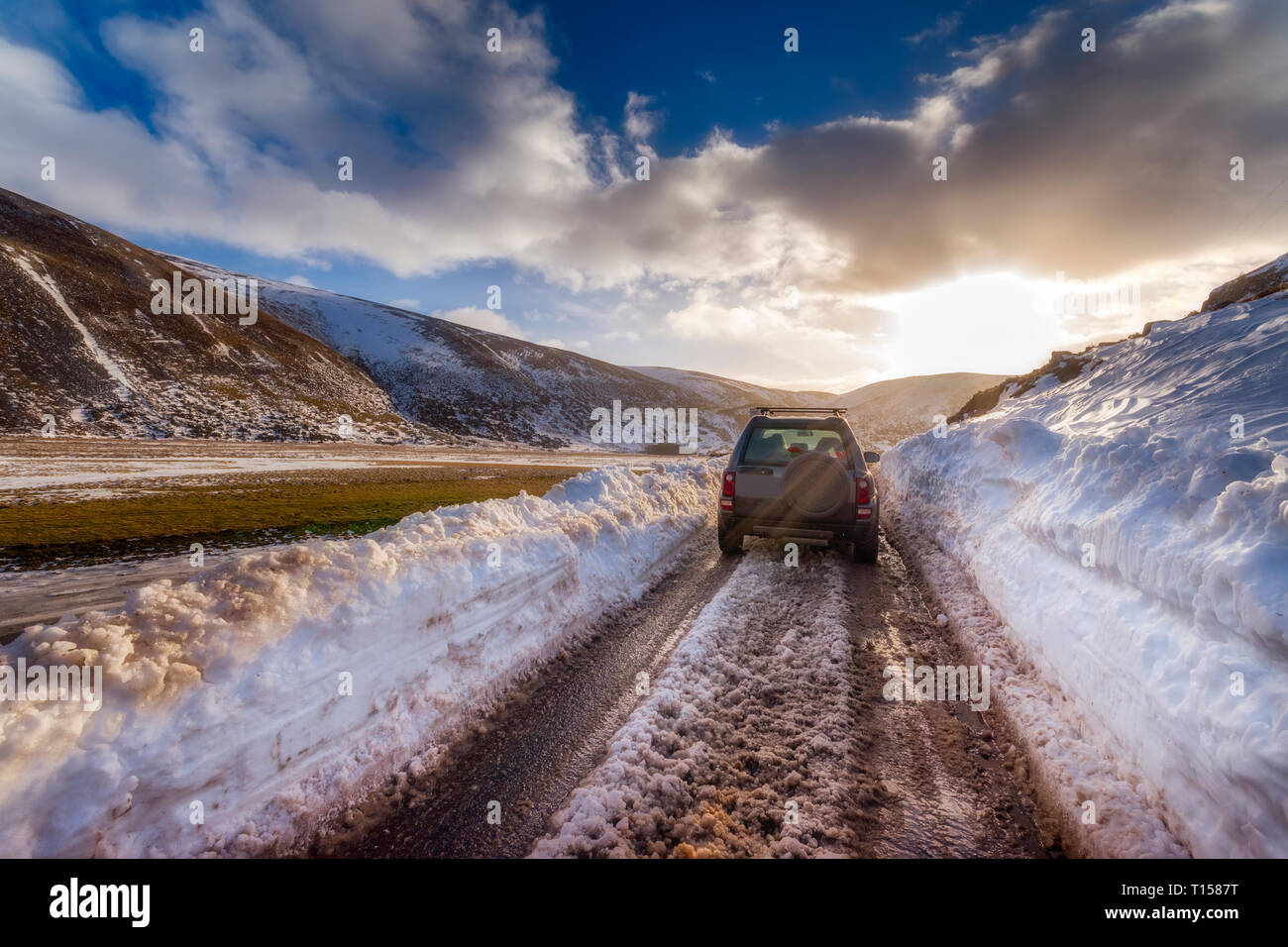 UK Scotland, Highlands, unclassified road, offroad 4x4 vehicle, snow ...