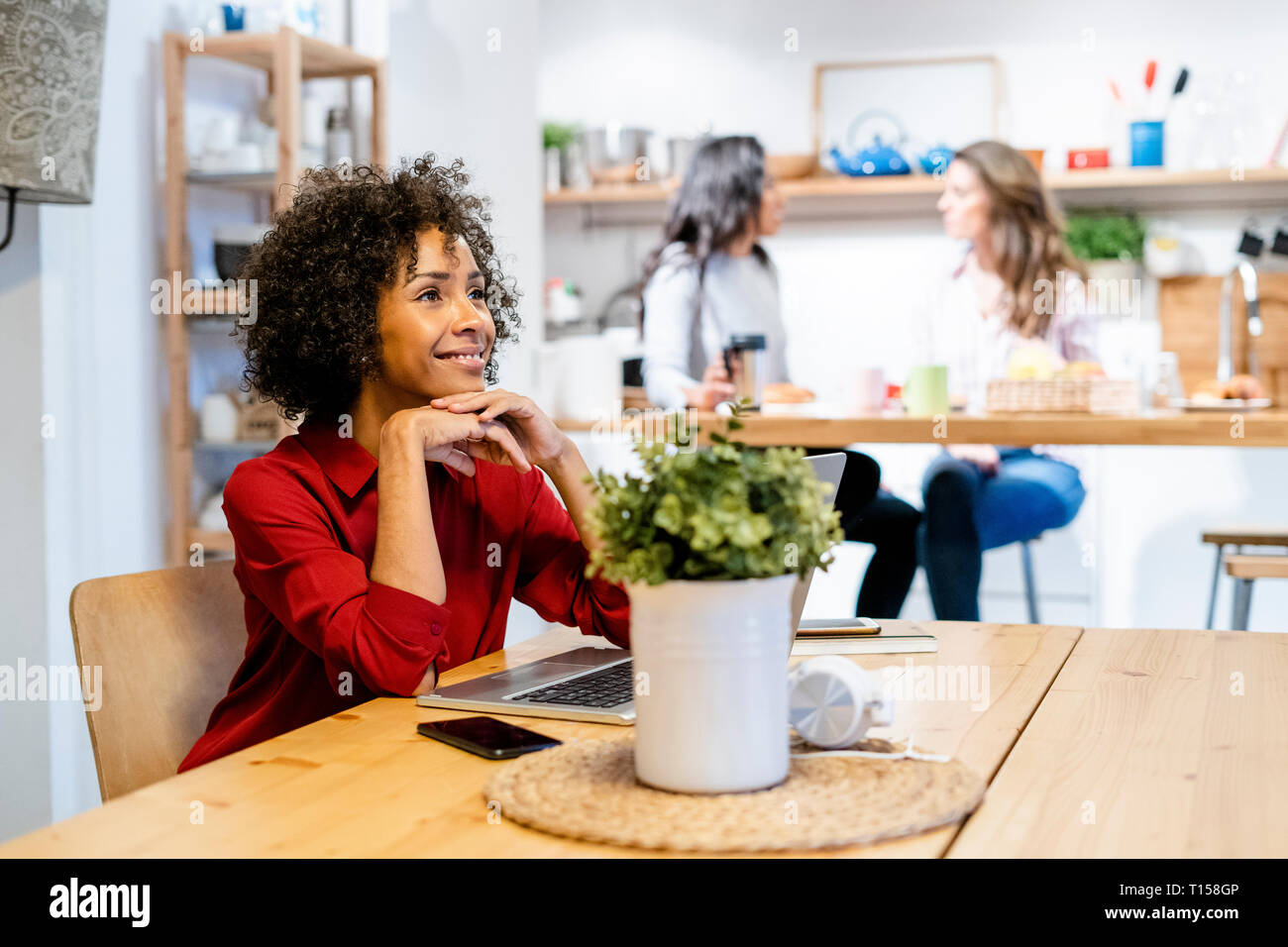 Three friends at home, living together Stock Photo - Alamy