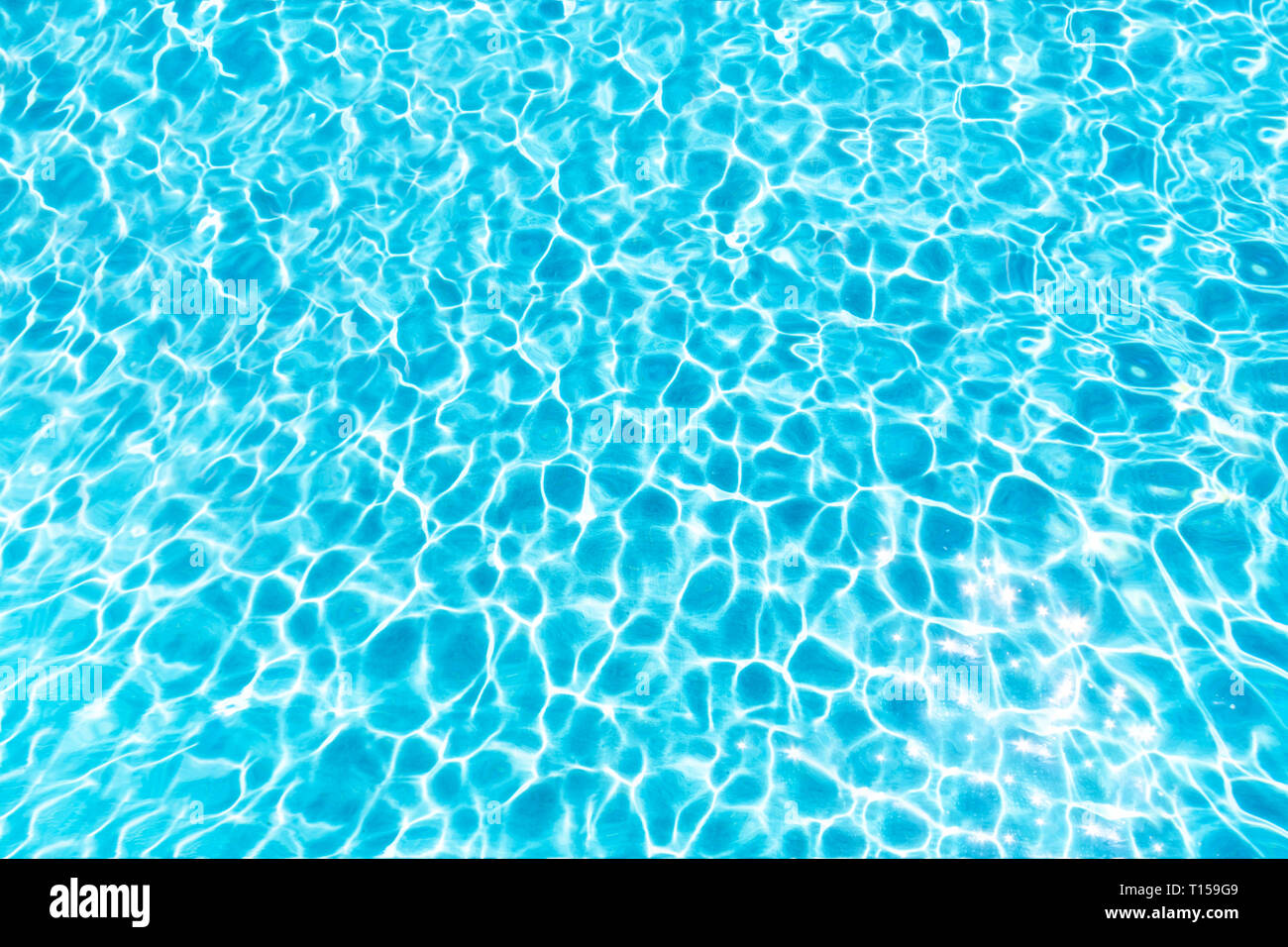 Swimming pool ripples Stock Photo - Alamy