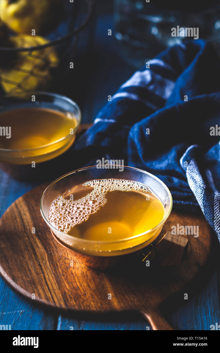 Tea cup of homemade hot quince infusion Stock Photo - Alamy