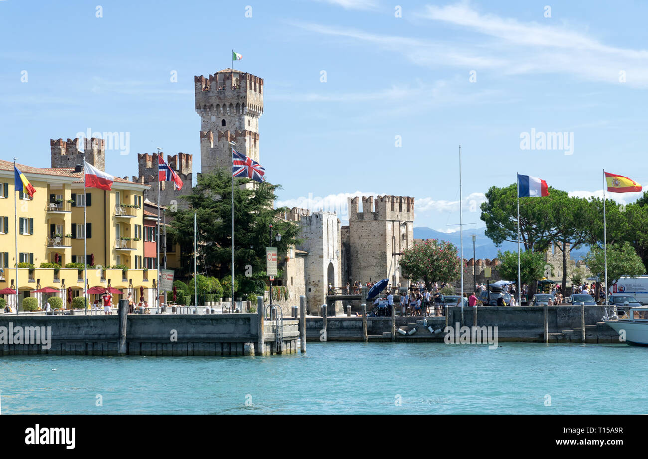 Sirmione, Italy - August 07 2017: View of Sirmione harbor and Scaligero ...
