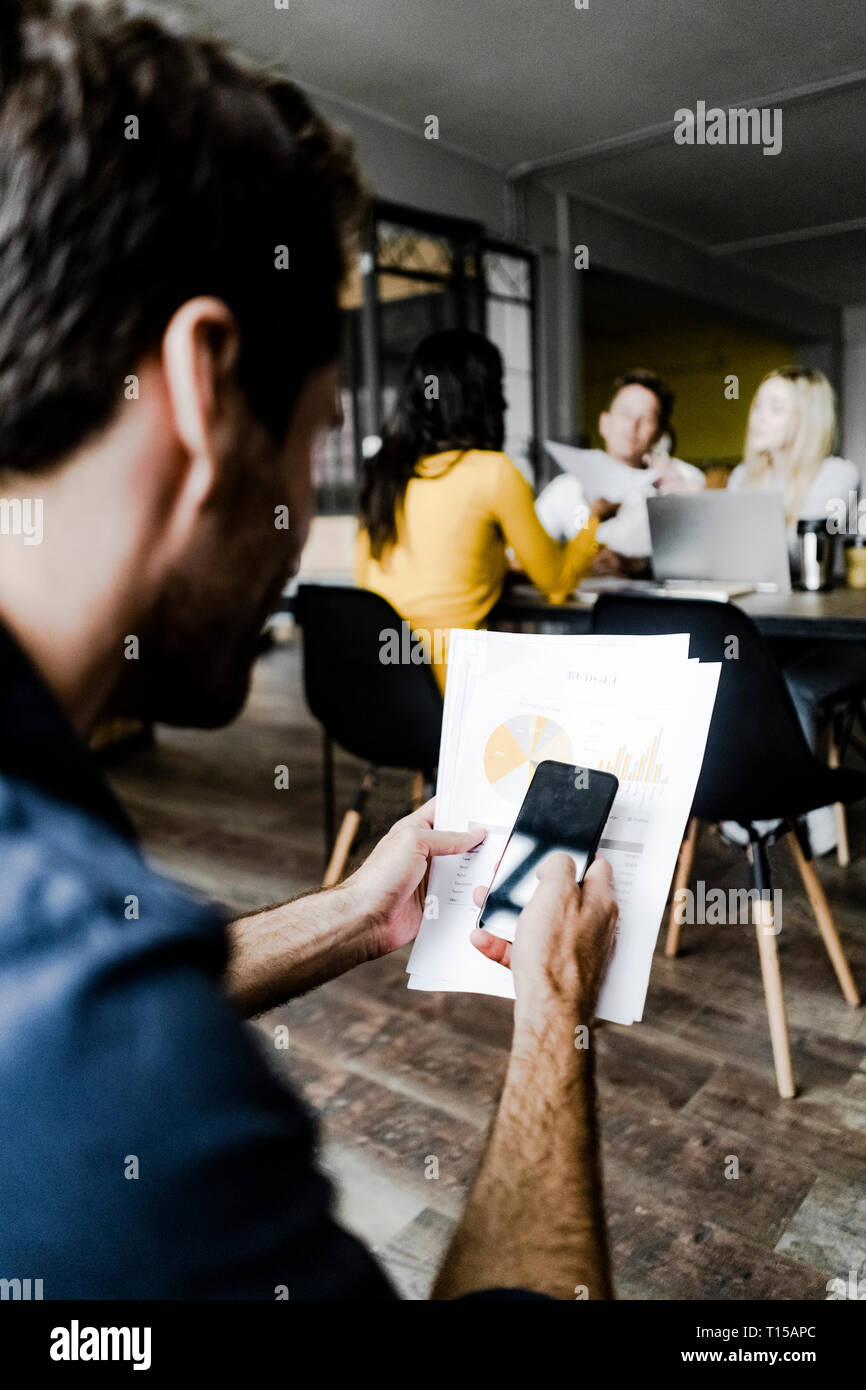 Phone during meeting hi-res stock photography and images - Alamy
