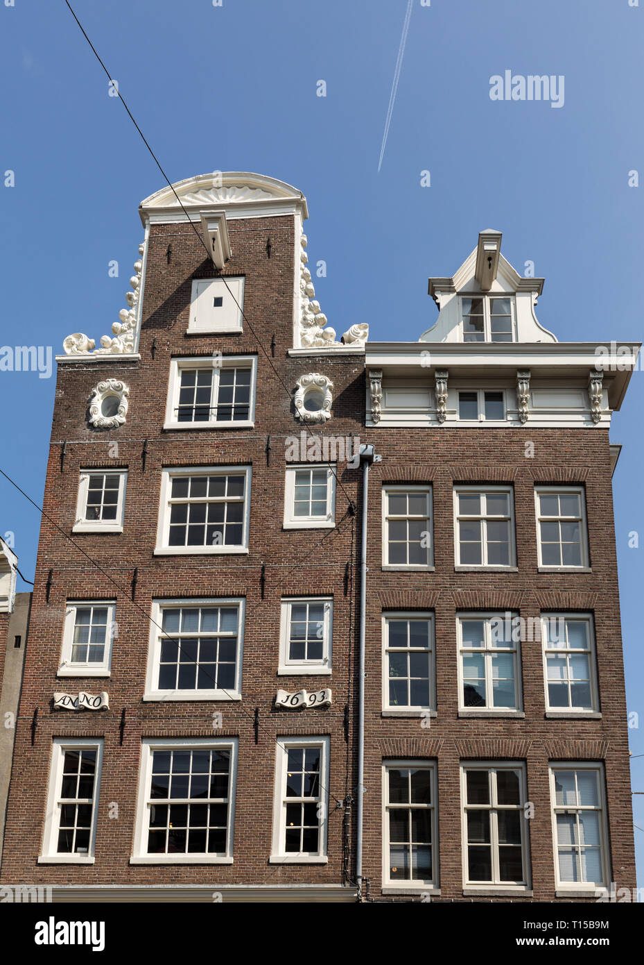 Traditional historic Dutch gable houses beside canal in Amsterdam The ...
