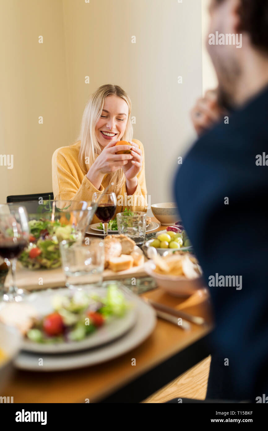 Friends having fun, eating lunch together Stock Photo - Alamy