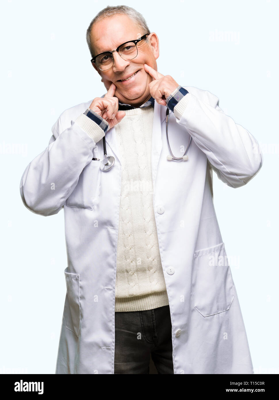 Handsome senior doctor man wearing medical coat Smiling with open mouth ...