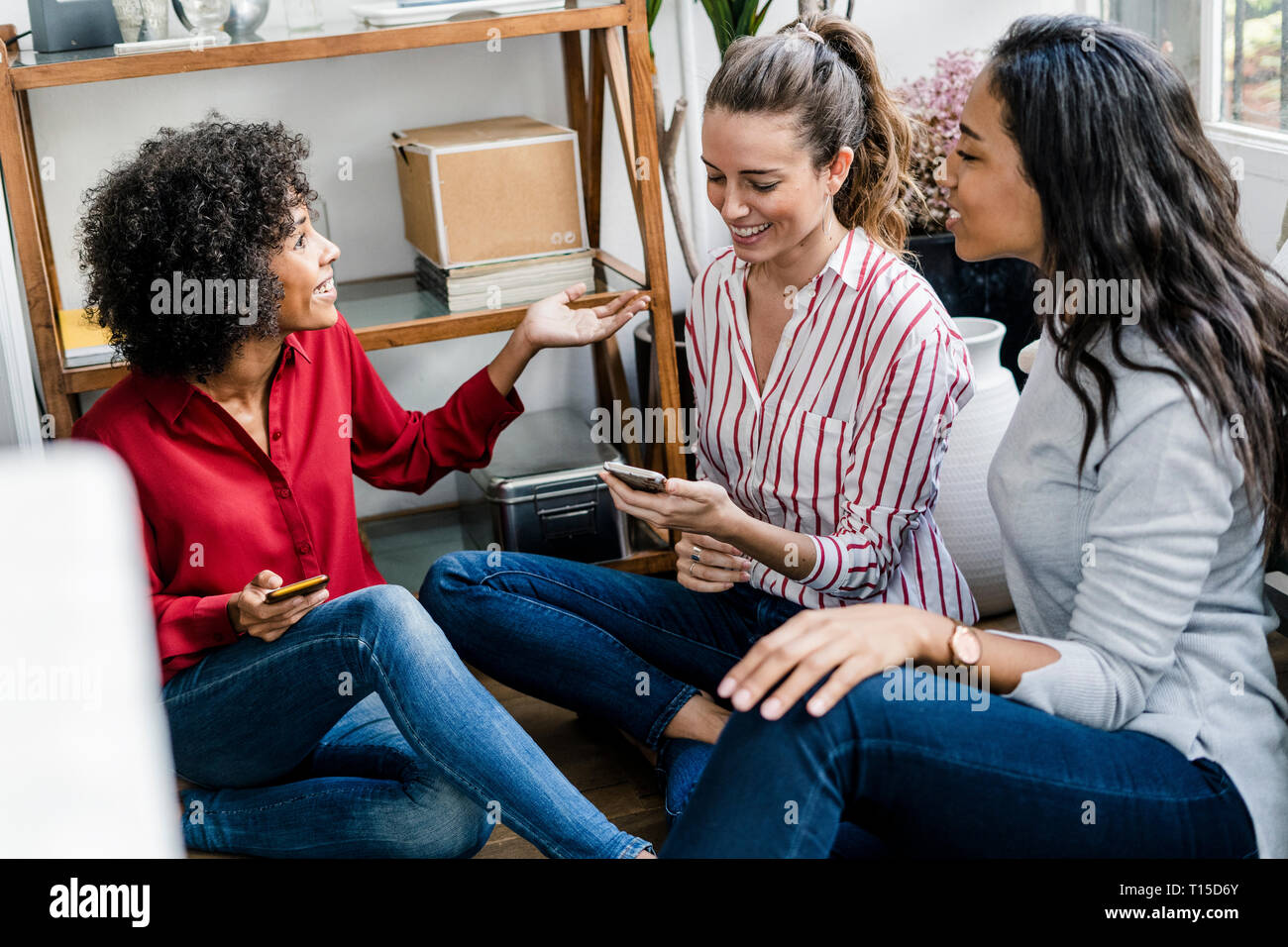 Three friends at home, living together Stock Photo - Alamy