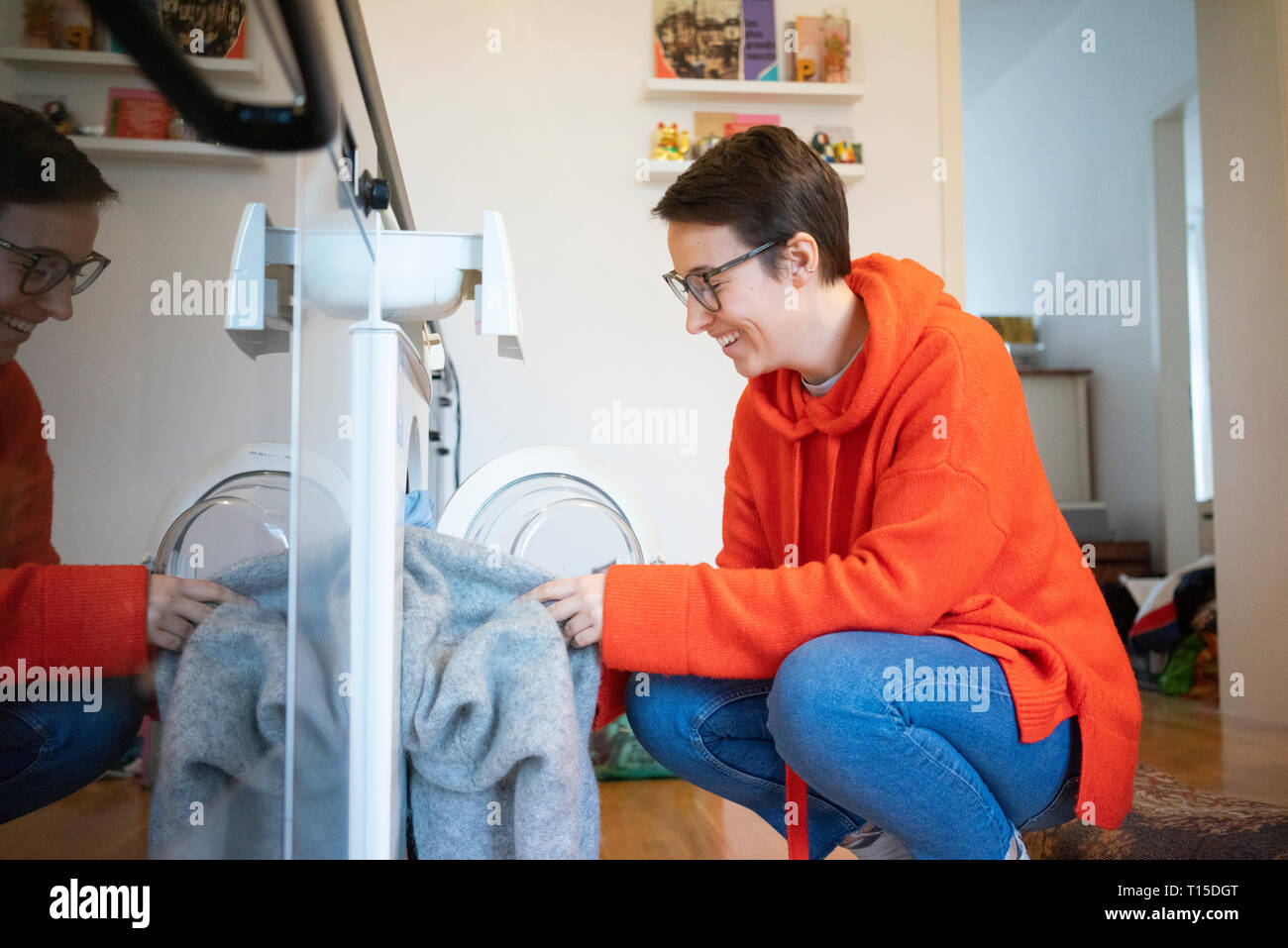 Doing laundry hi-res stock photography and images - Alamy