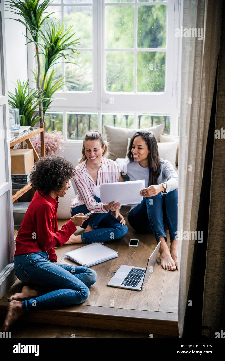 Three friends at home, living together Stock Photo - Alamy