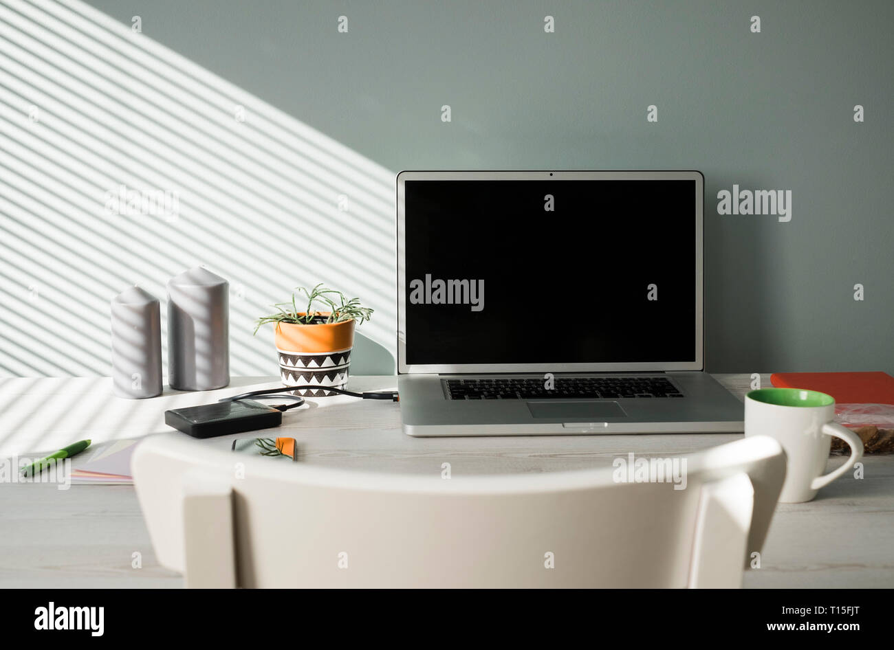 Opened laptop on an office desk Stock Photo - Alamy