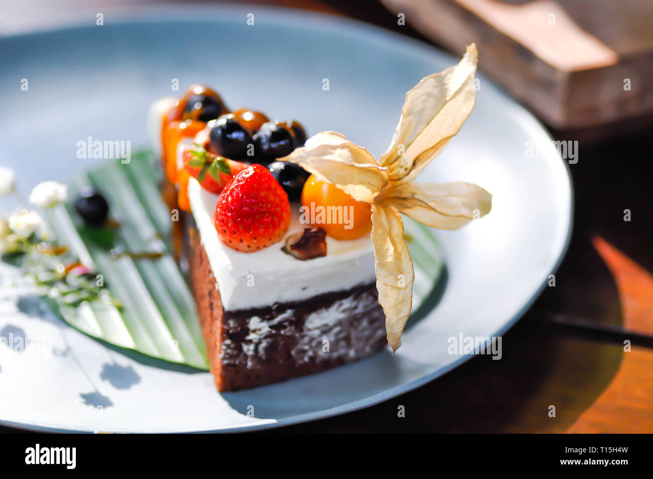fruit cake ,chocolate cake with fruit topping Stock Photo - Alamy