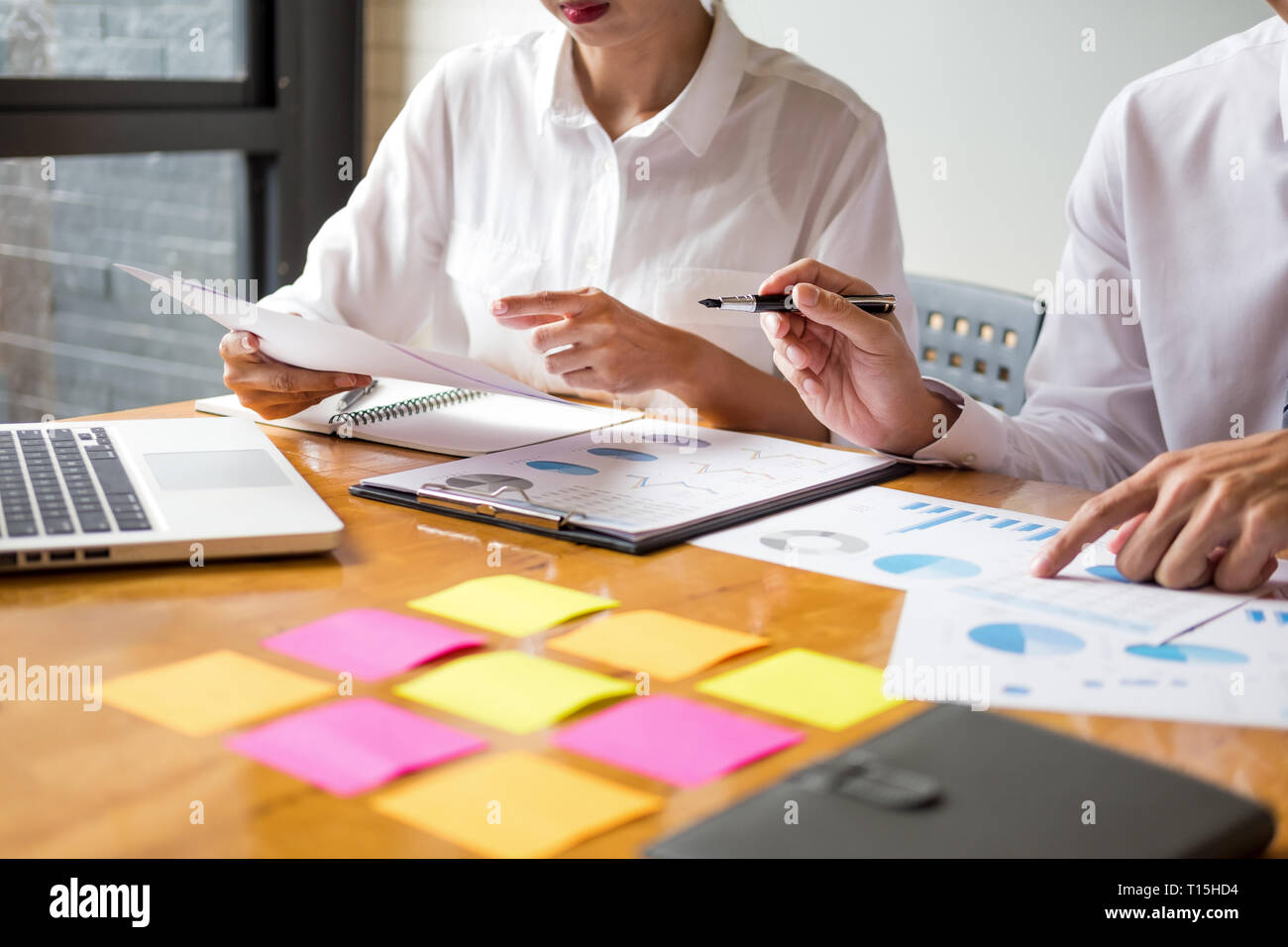 Business team data analyzing income charts document during discussion ...