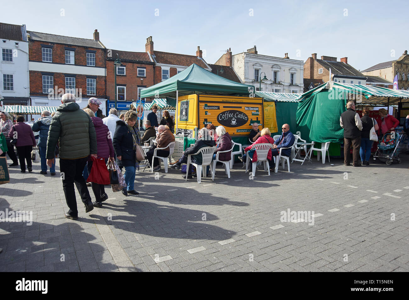 Pavement cafe and street scene, people enjoying food and drinks in the ...