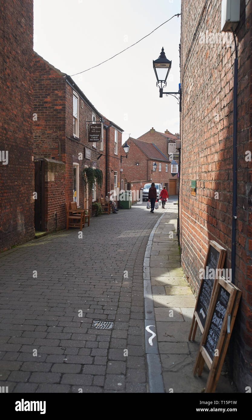 An Old cobbled street leading from the Saturday market, Beverley Market ...