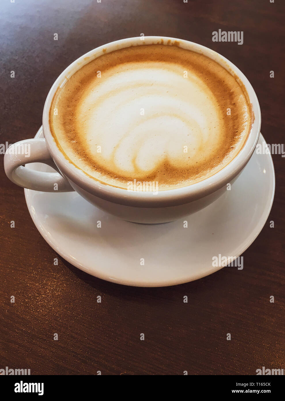 Breakfast, food and drinks and service concept - Cappuccino in a ...