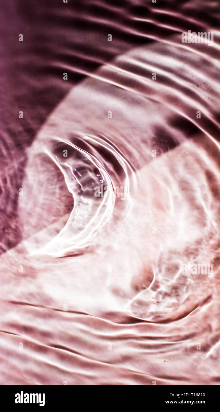 Pink flowing water texture as an abstract background - colourful ...