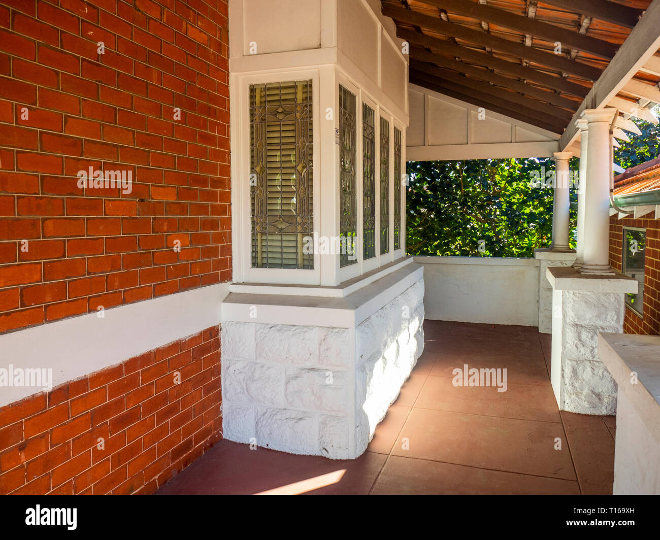 Bay window with leadlights on a verandah a feature of a residential ...