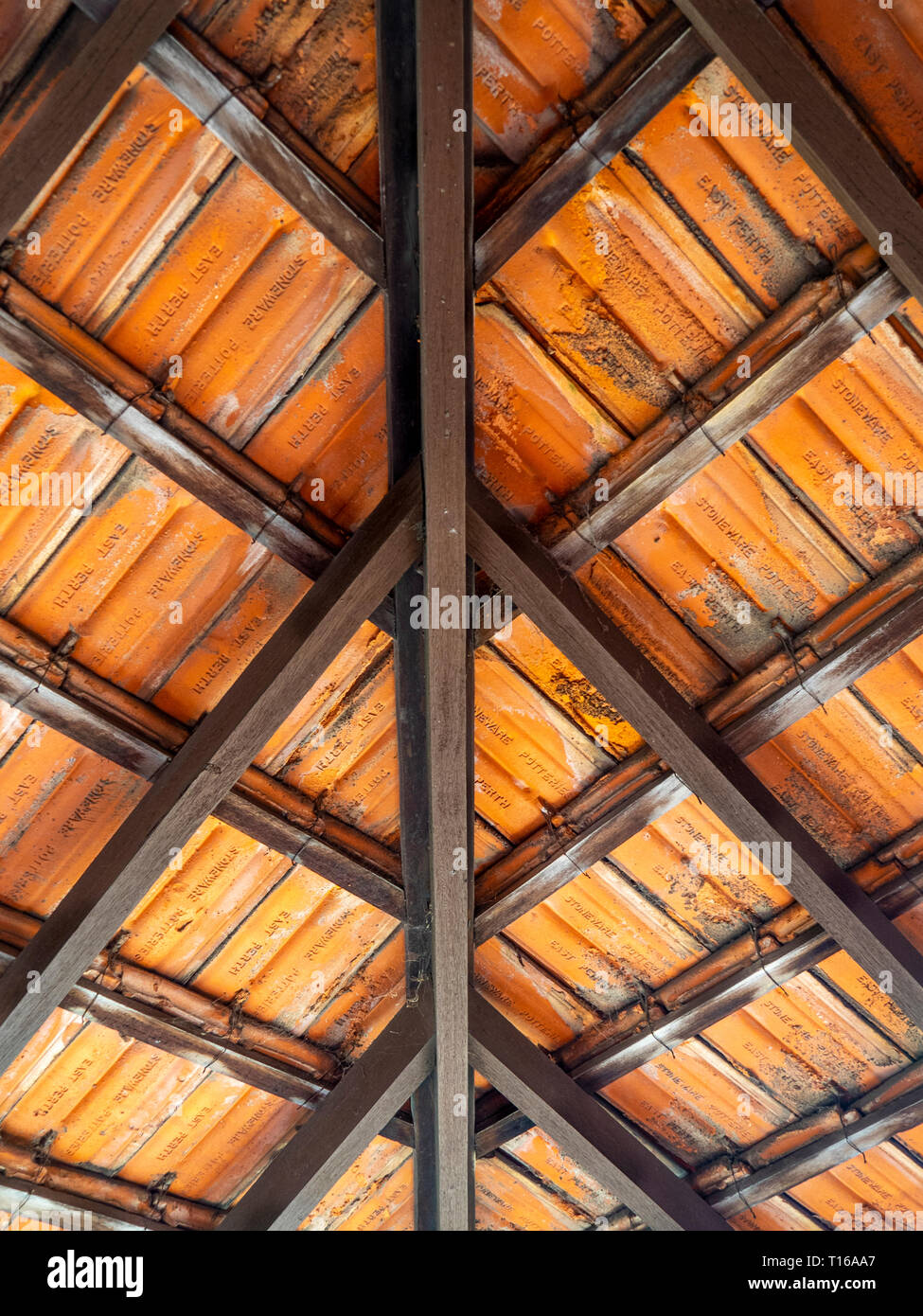 Underside of a terracotta roof of a residential veranda Stock Photo - Alamy