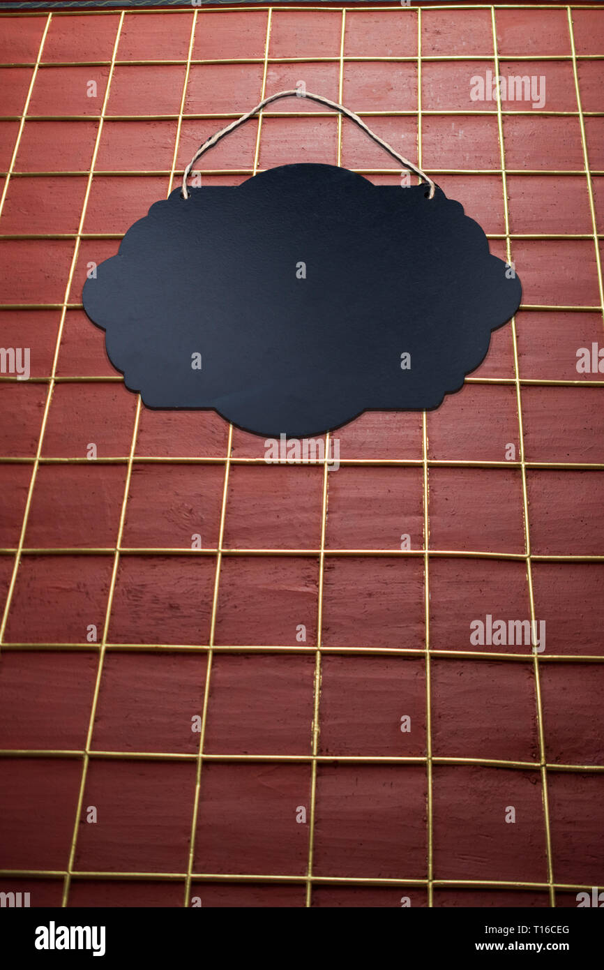 Black Empty Sign Board with string for hanging on wall Stock Photo - Alamy
