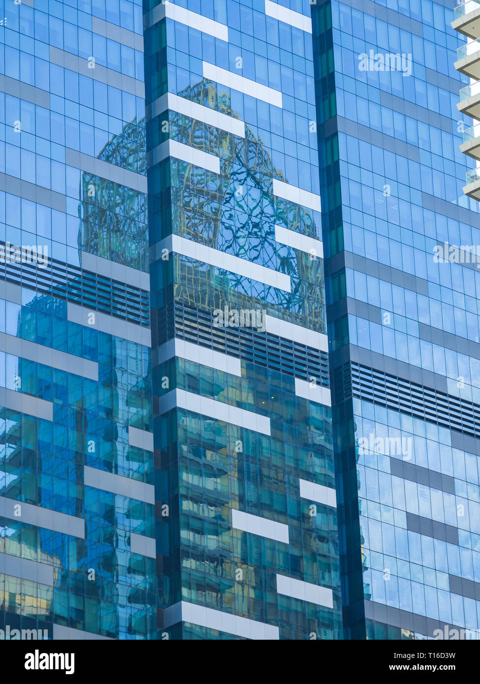 Skyscraper reflections on the windows in SIngapore Stock Photo - Alamy