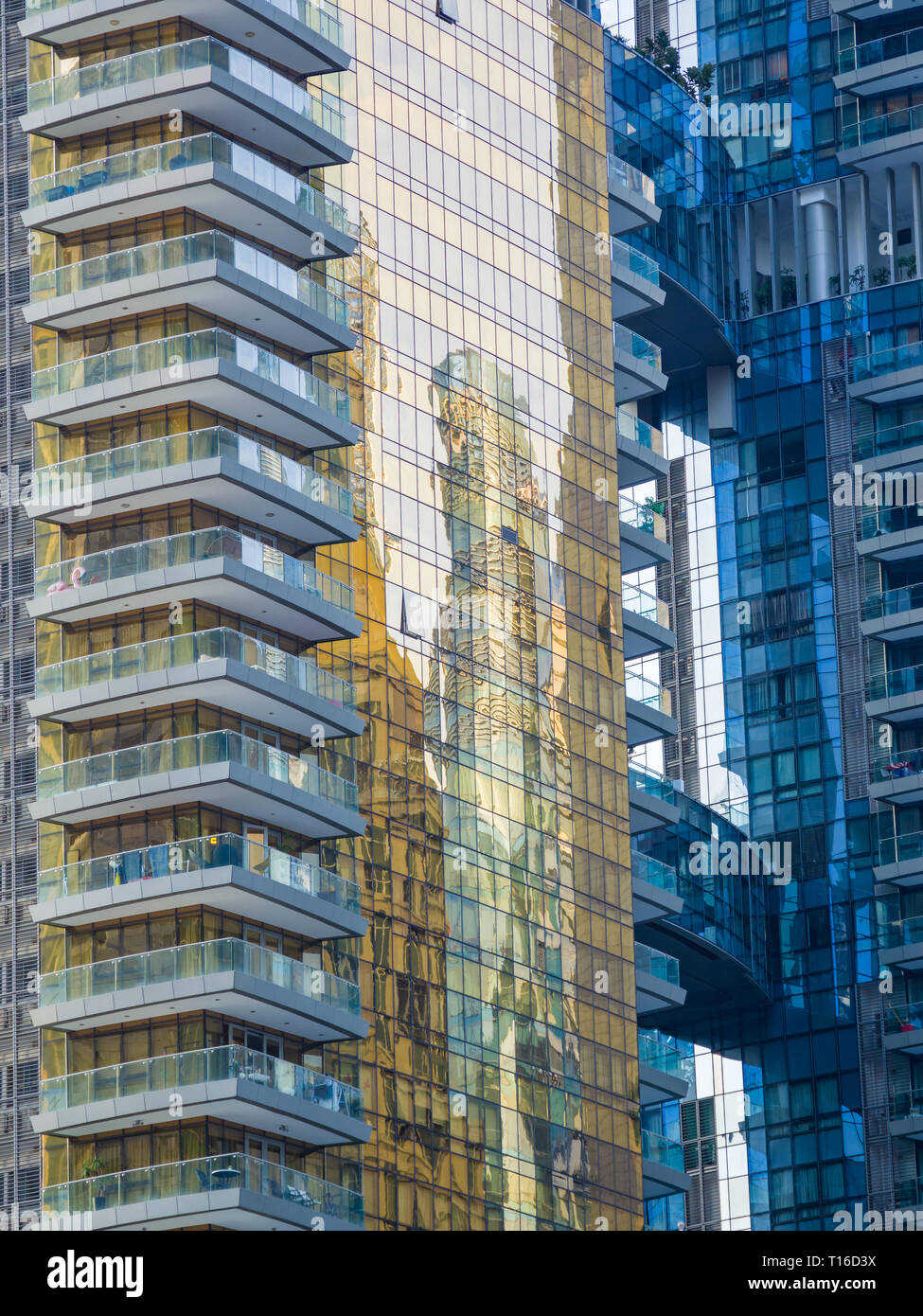 Skyscraper reflections on the windows in SIngapore Stock Photo - Alamy