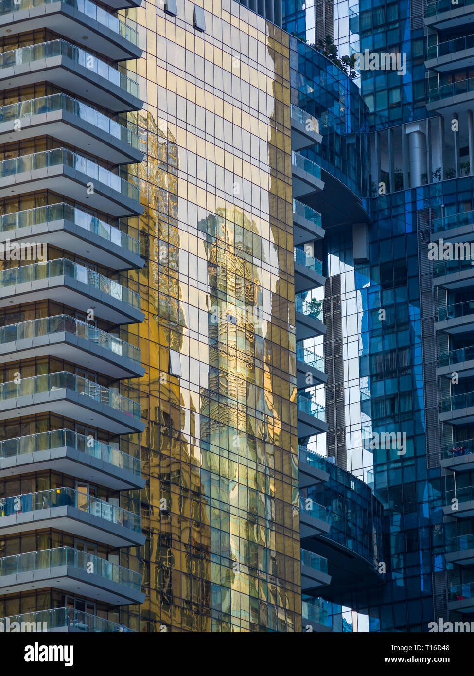 Skyscraper reflections on the windows in SIngapore Stock Photo - Alamy