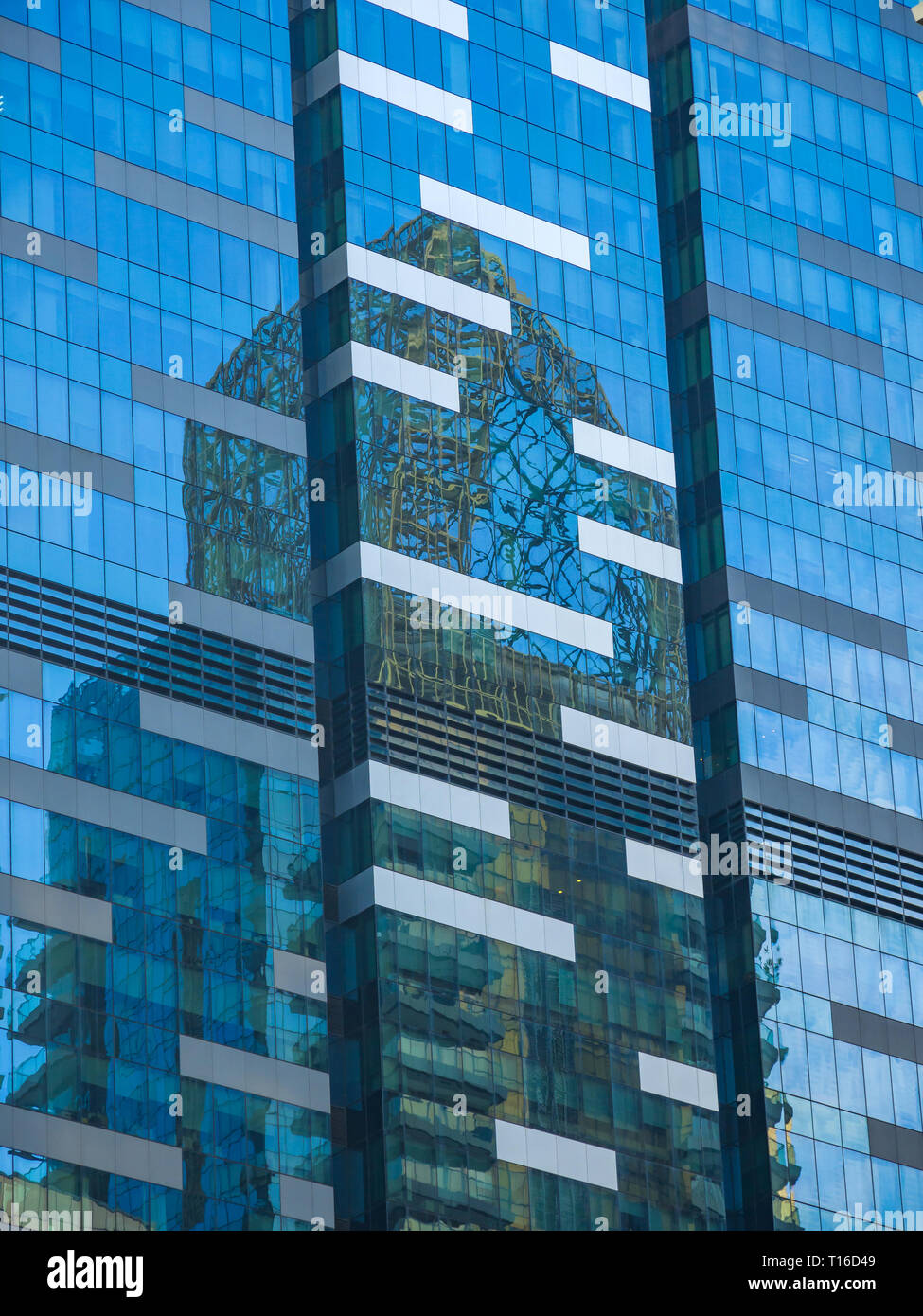 Skyscraper reflections on the windows in SIngapore Stock Photo - Alamy