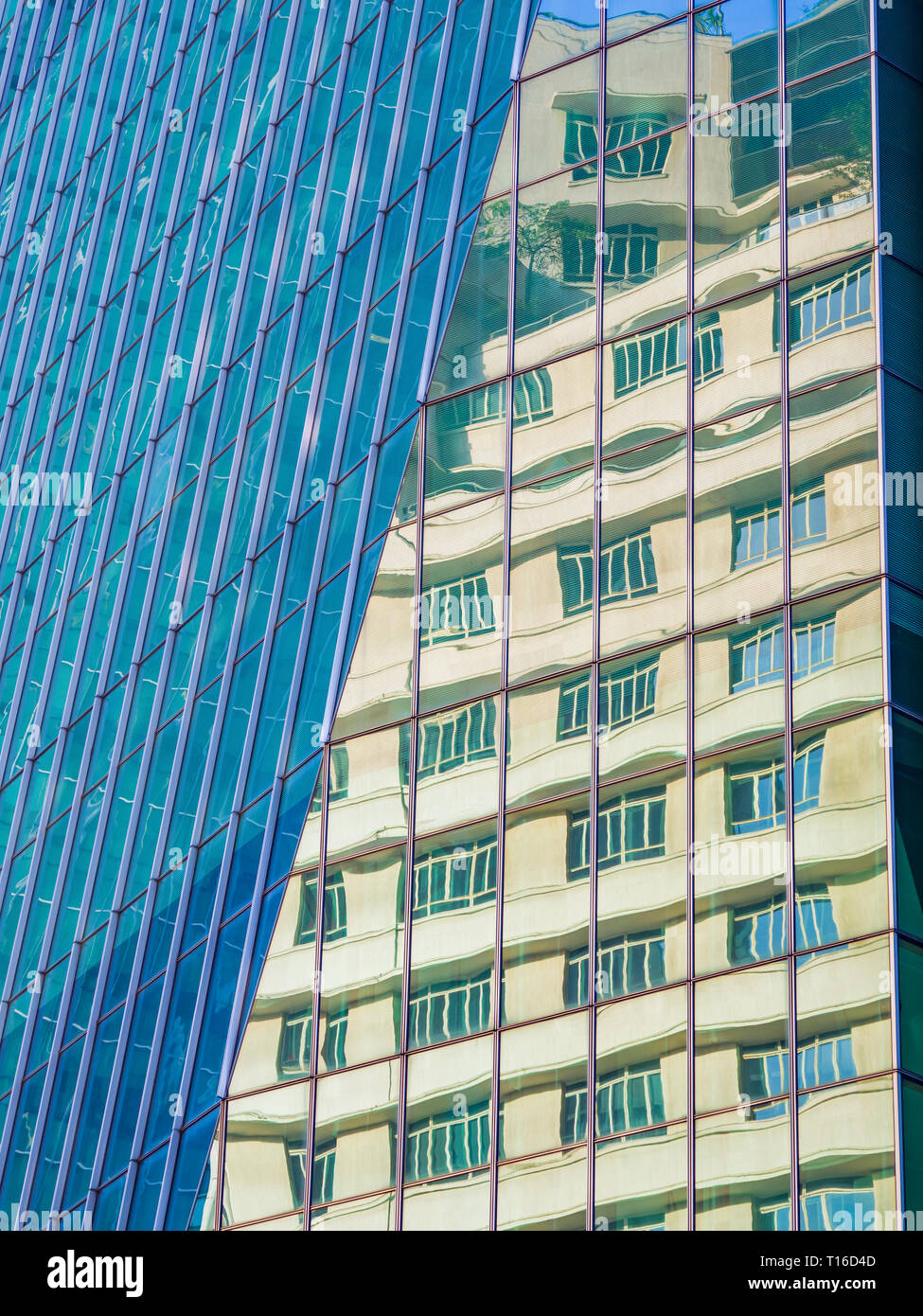 Skyscraper reflections on the windows in SIngapore Stock Photo - Alamy