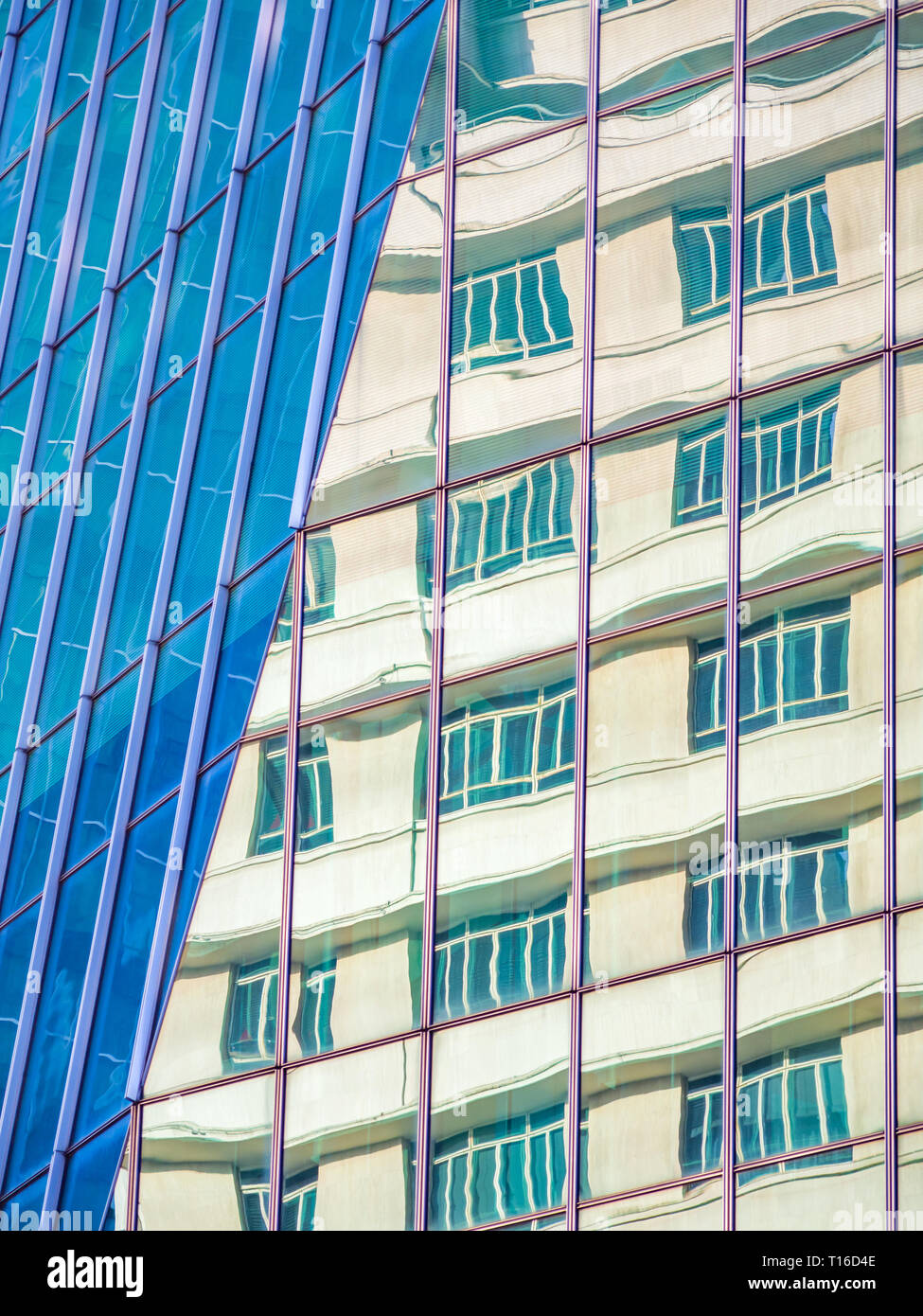 Skyscraper reflections on the windows in SIngapore Stock Photo - Alamy