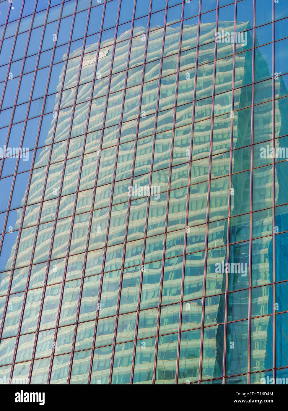 Skyscraper reflections on the windows in SIngapore Stock Photo - Alamy