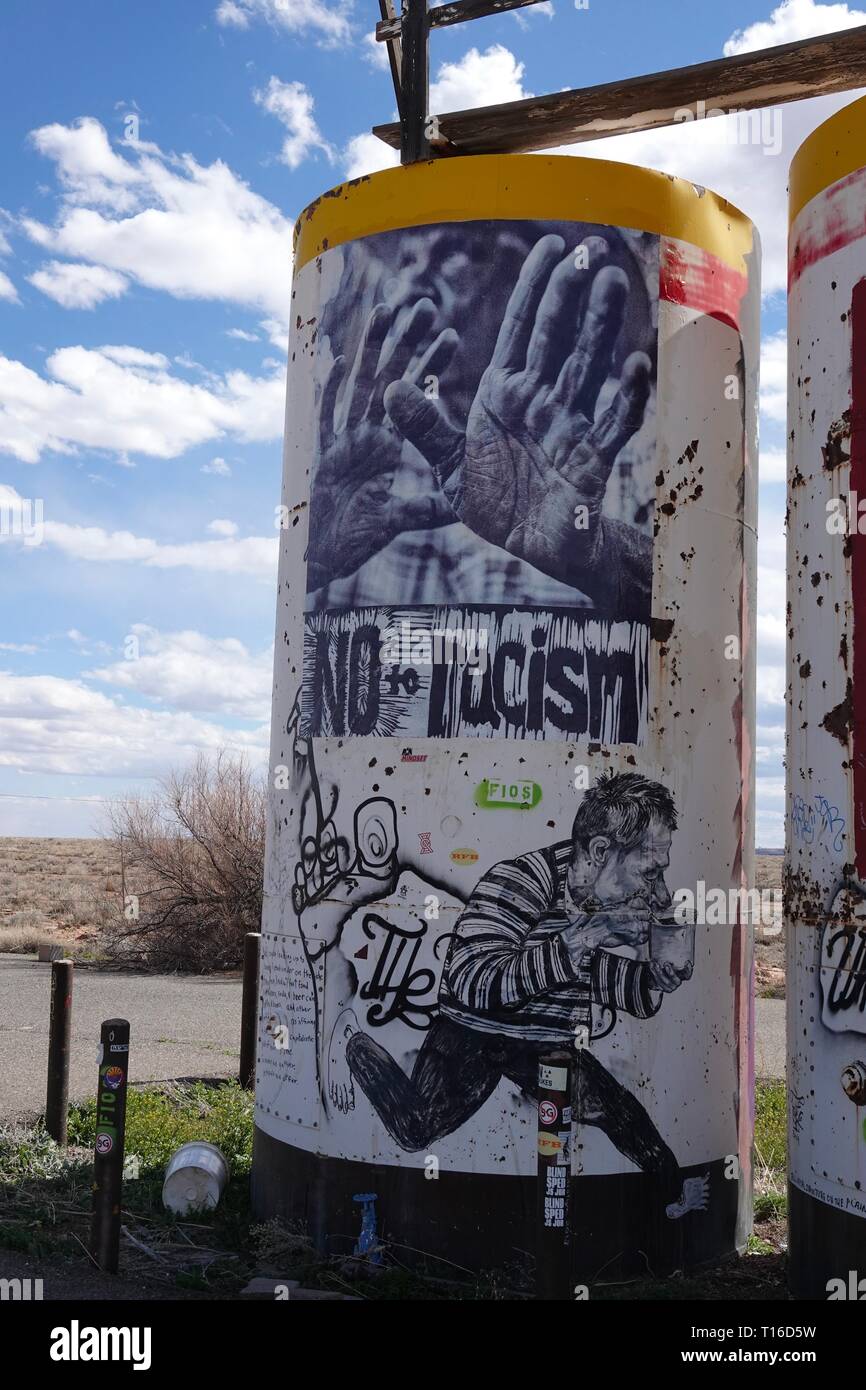 On the road north to Page, Arizona graffiti covers many of abandoned ...