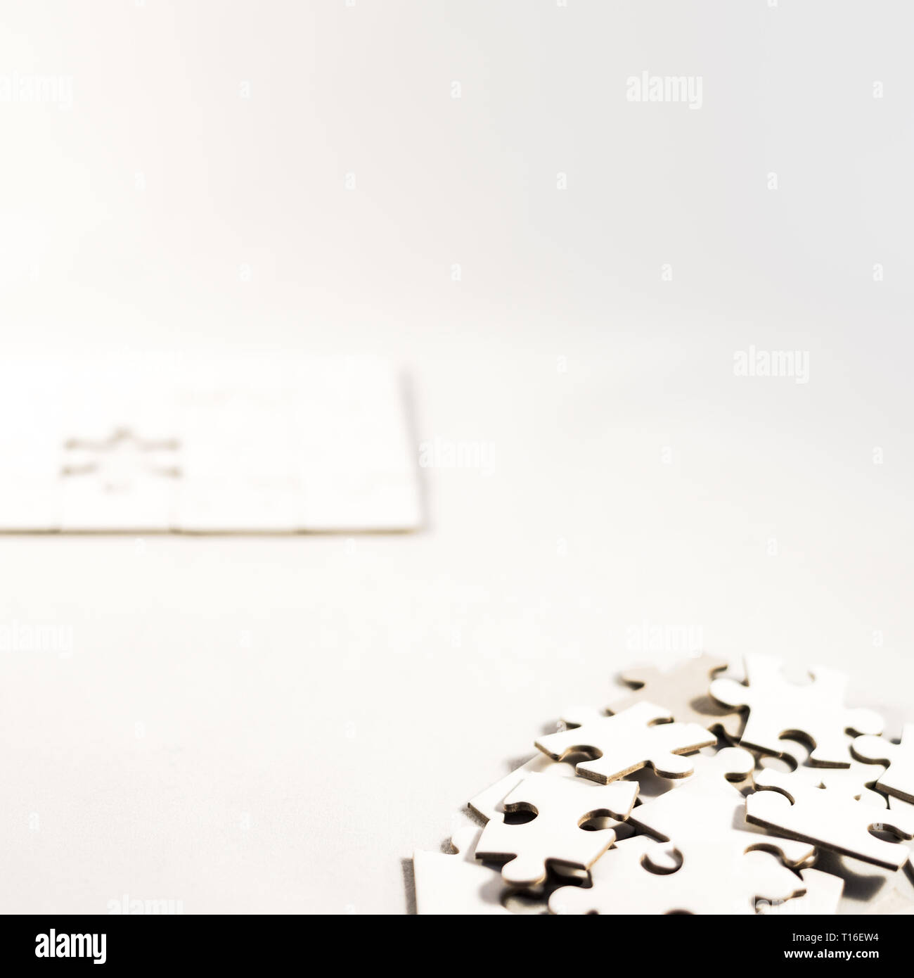 white jigsaw/puzzle whit one gap, symbol of problem solving Stock Photo ...