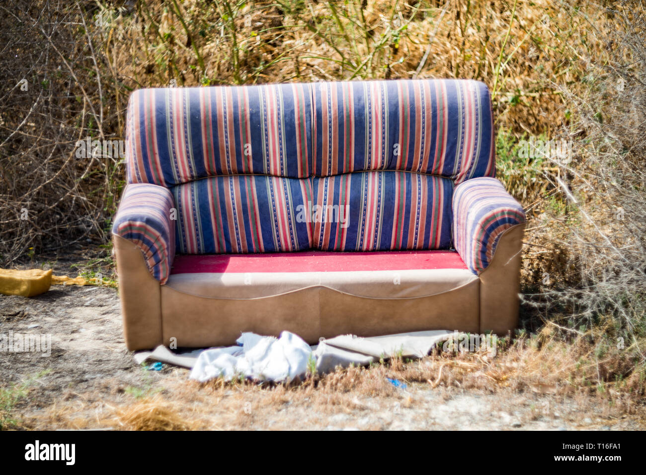 Sofa thrown away hi-res stock photography and images - Alamy