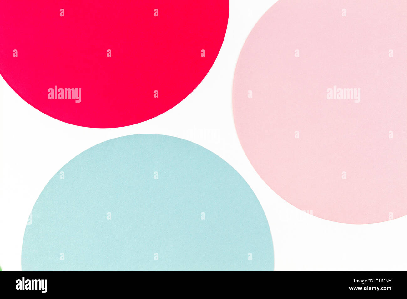Abstract color paper background. Pastel blue, pink and red color round ...