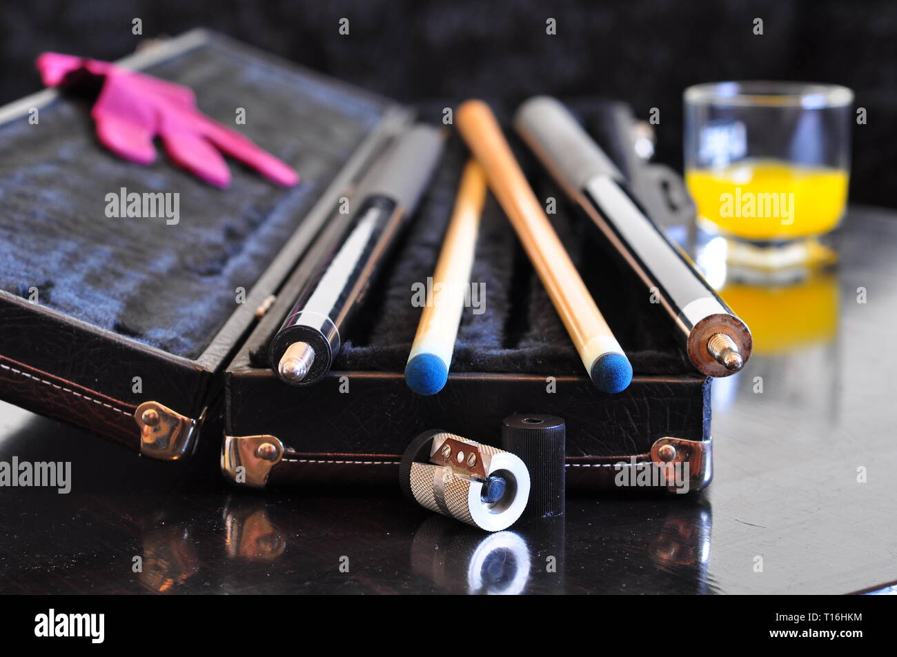 Open trunk cue case and the cues for the game of pool Stock Photo - Alamy