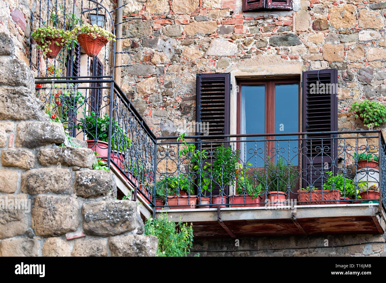 Balcony flowers in tuscany hi-res stock photography and images - Alamy