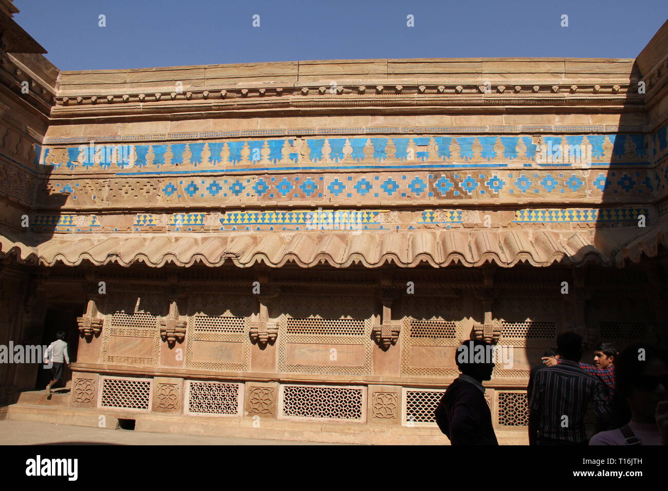 A view of the turquoise blue-tiled carved wall, Gwalior fort, Madhya ...