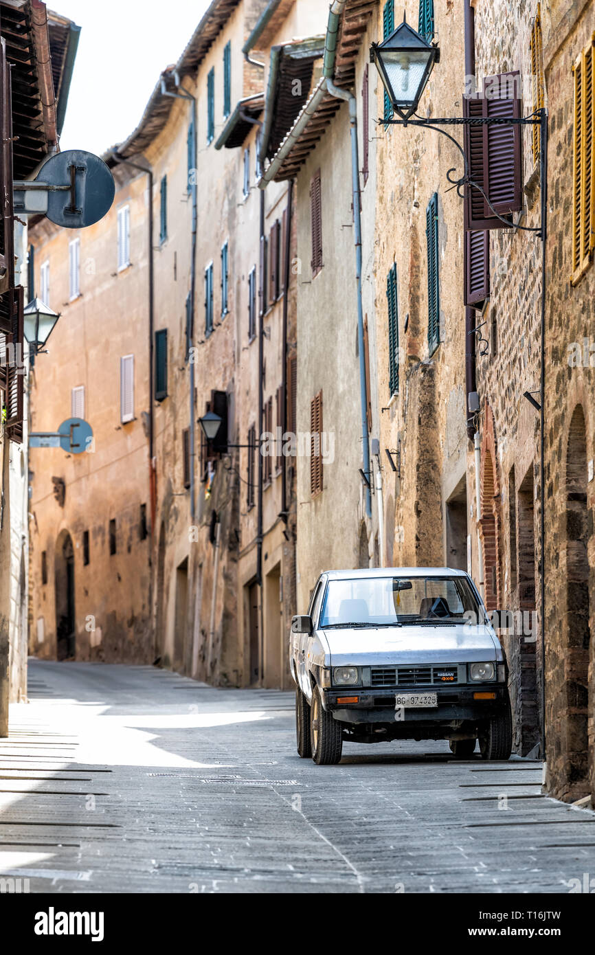 Montalcino, Italy - August 26, 2018: Small historic vertical town stone ...