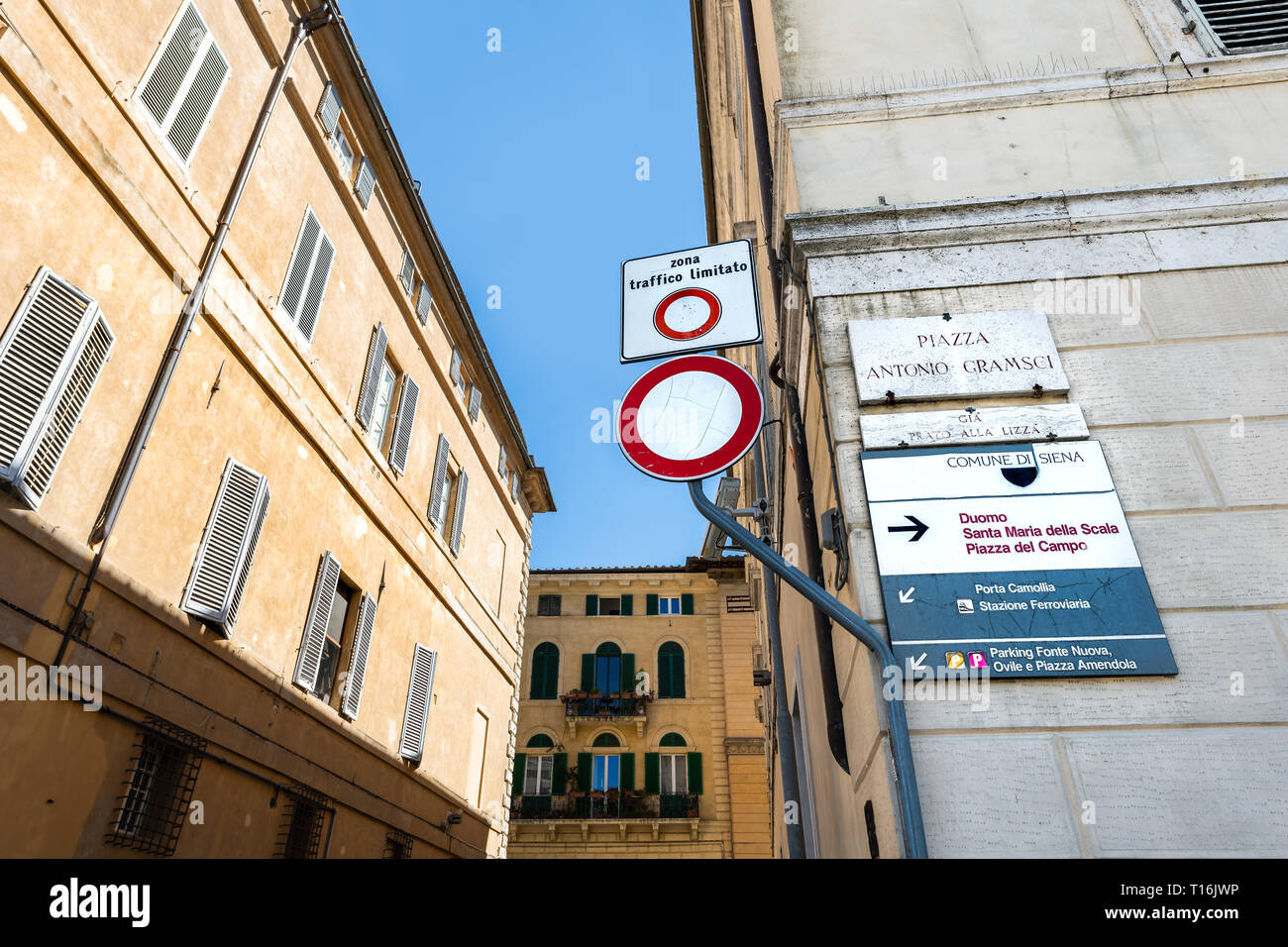 Siena, Italy - August 27, 2018: Street in old town village in Tuscany ...