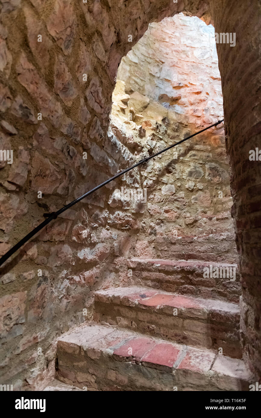 Castiglione del Lago, Italy Fortress vertical view winding stone steps ...