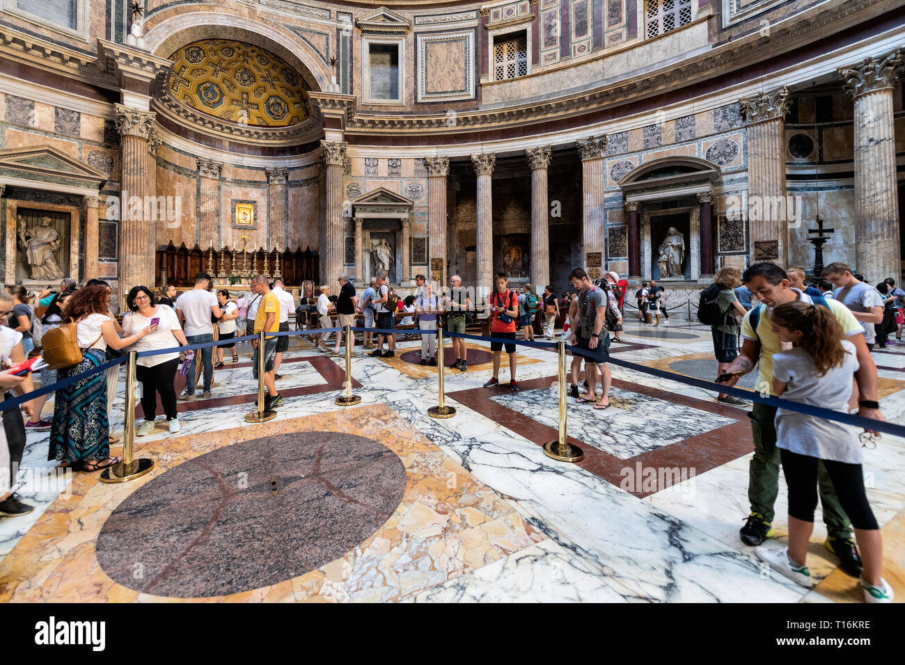 Rome, Italy - September 4, 2018: Crowd of people in building interior architecture of Pantheon ...
