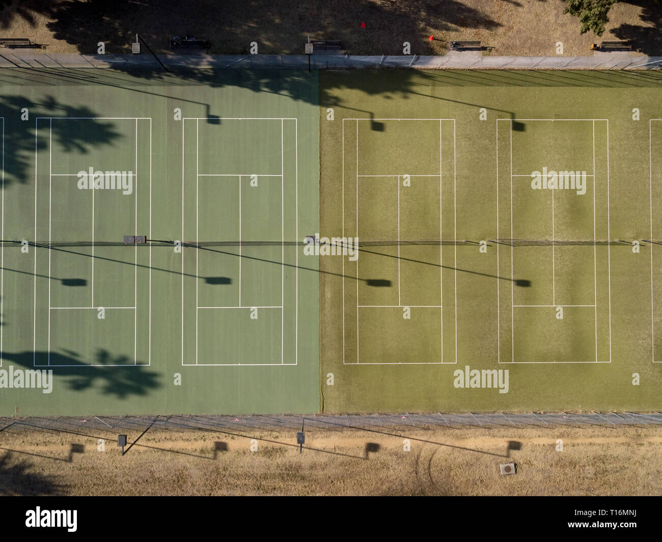 Tennis court aerial view showing green surface, tennis nets, tennis ...