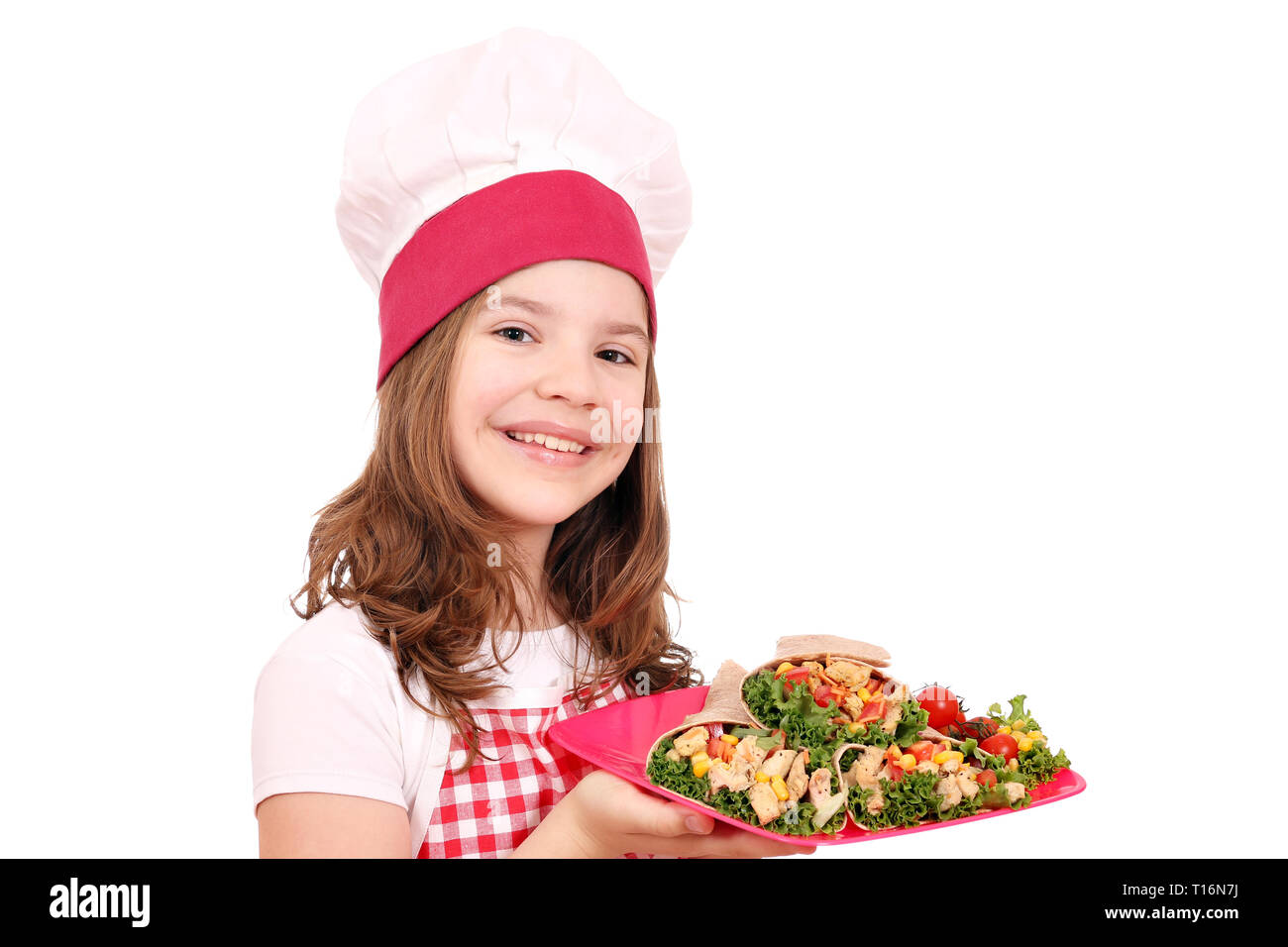 Happy little girl cook with burritos fast food Stock Photo - Alamy