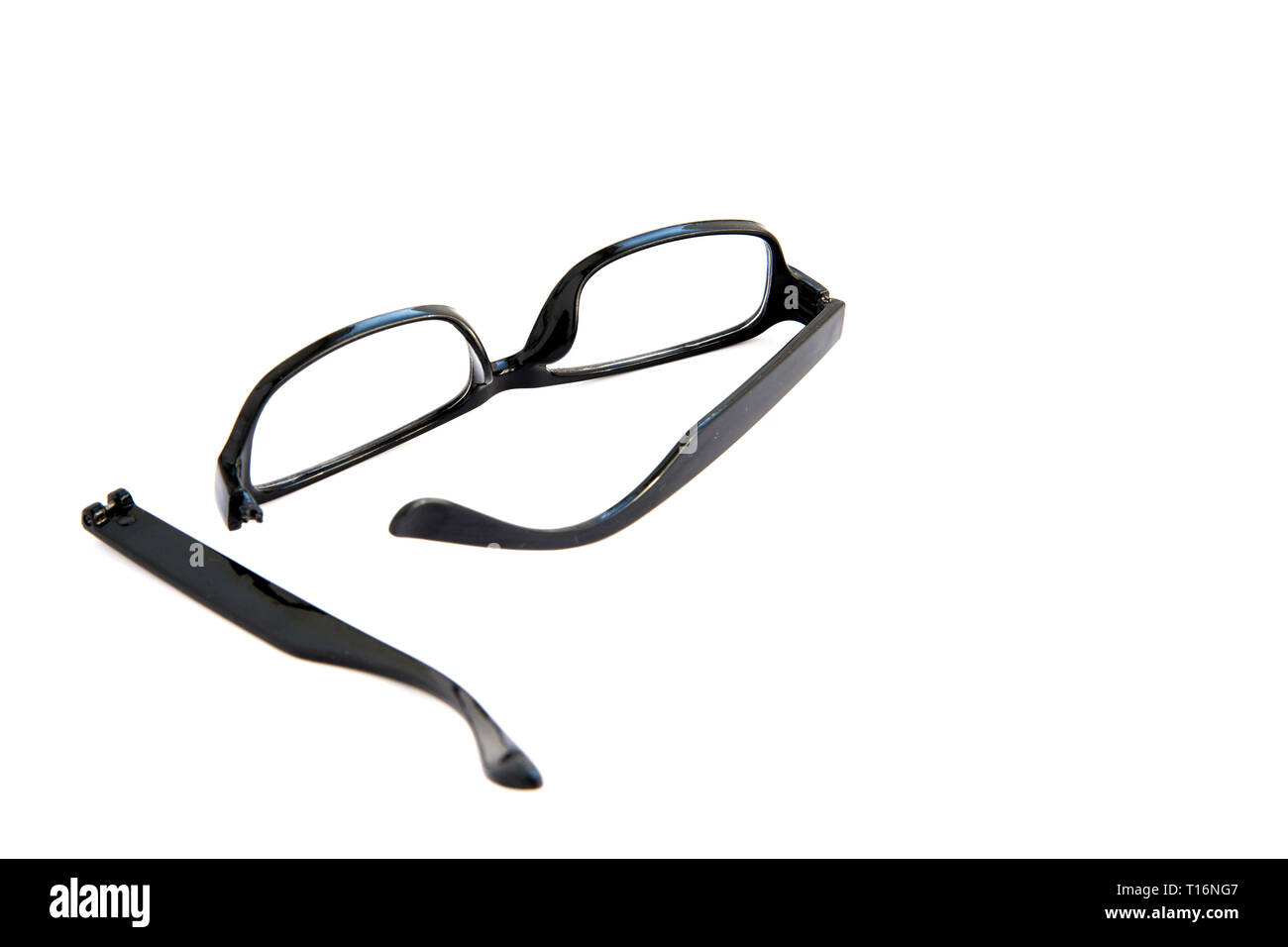 Broken eye glasses, isolated on white background. Black celluloid frame ...