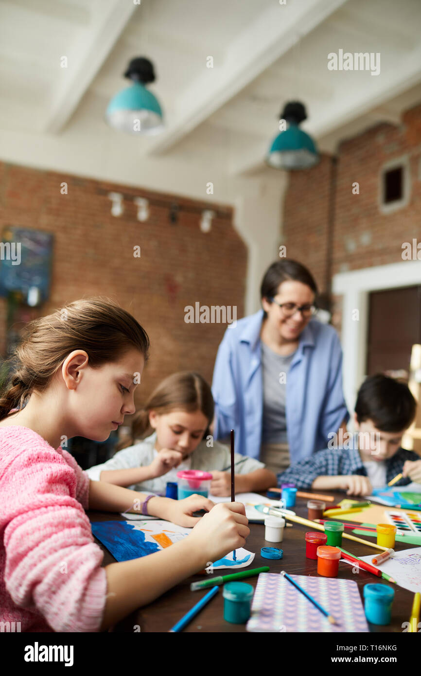 Children painting in Art Class Stock Photo - Alamy