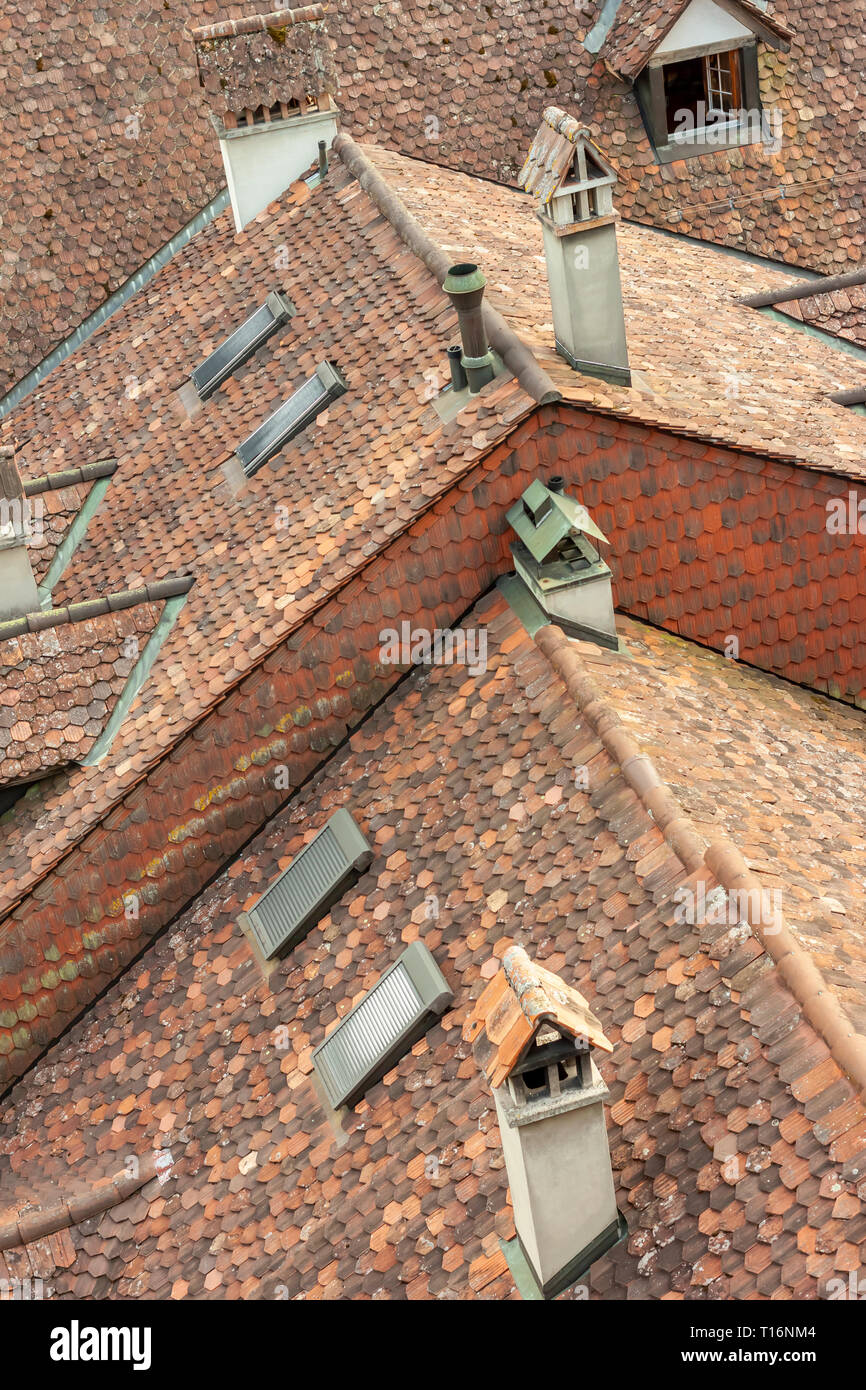 ancient old red roofs in Bern town center background Stock Photo - Alamy