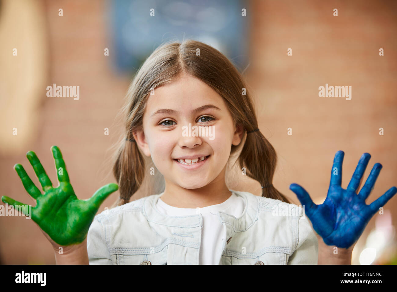 Girl Having Fun with Paint Stock Photo - Alamy