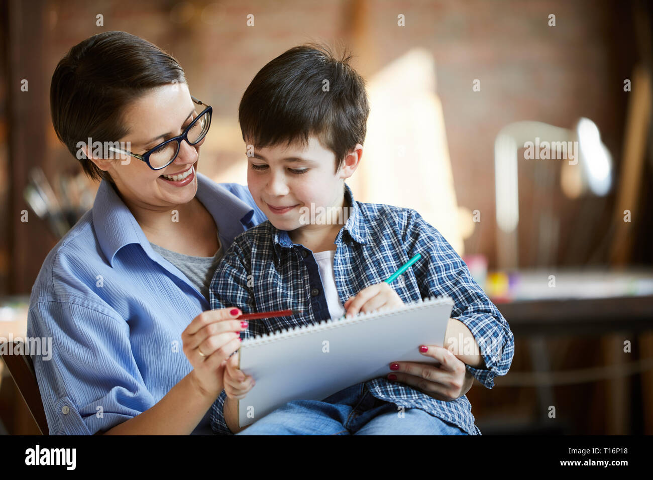 Modern Mother and Son Drawing Stock Photo - Alamy