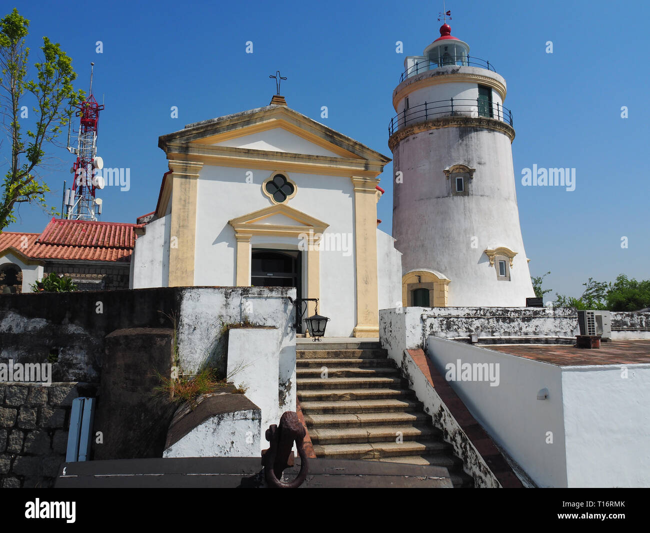 A front view of the lighthouse and the chapel located at the Guia ...